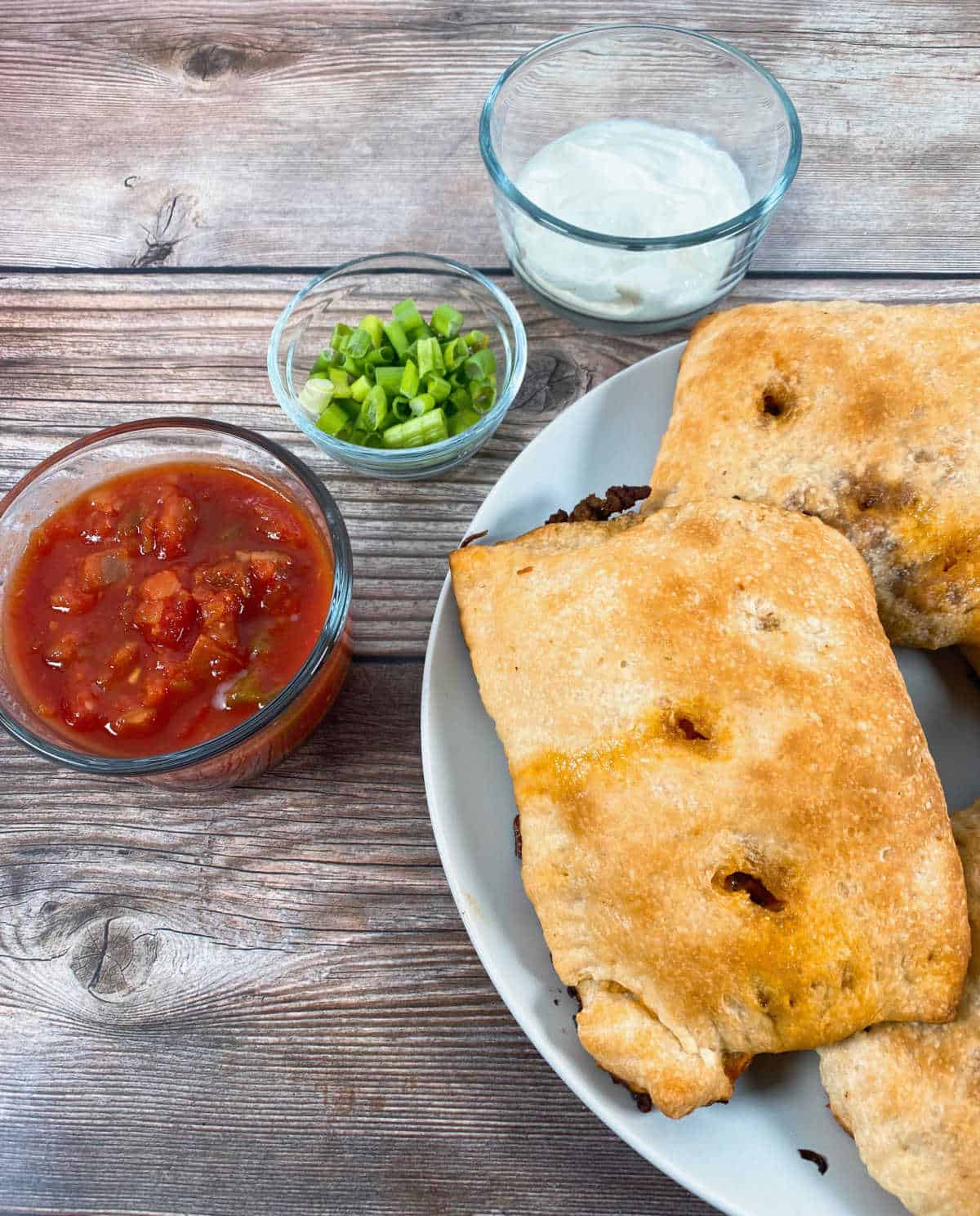 Easy Cheesy Taco Calzones - Cookaholic Wife